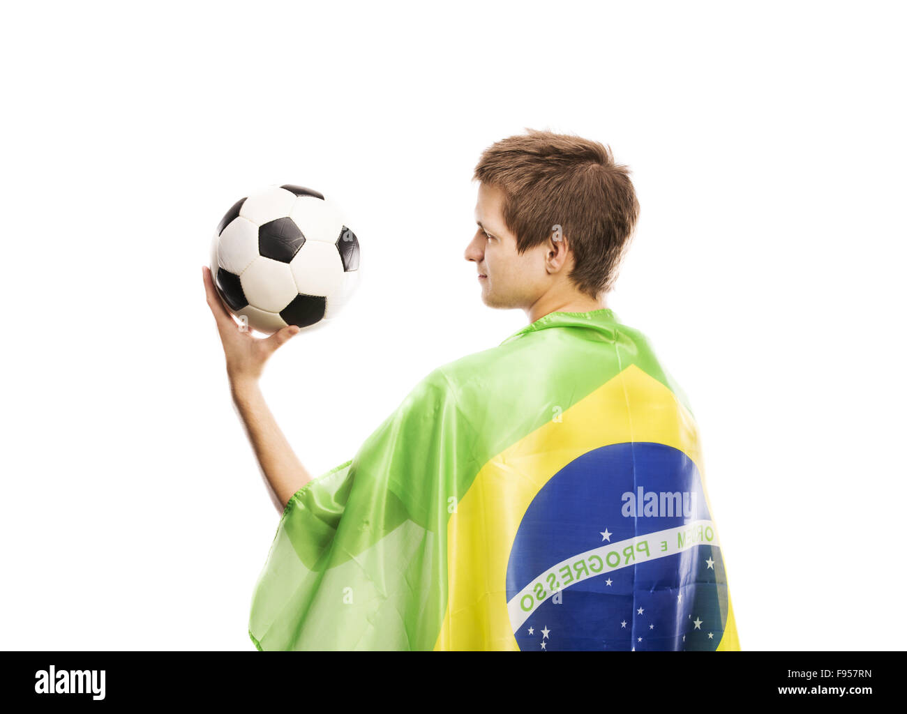 Brazilian soccer fan holding ball and flag of Brazil, isolated on white ...