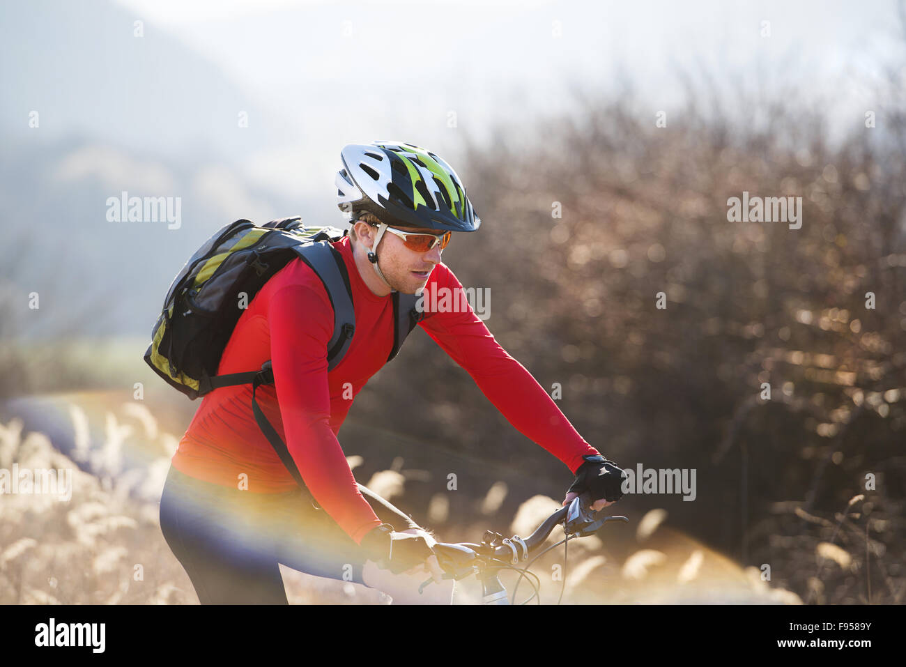 cyclist man riding mountain bike on outdoor trail in nature Stock Photo ...