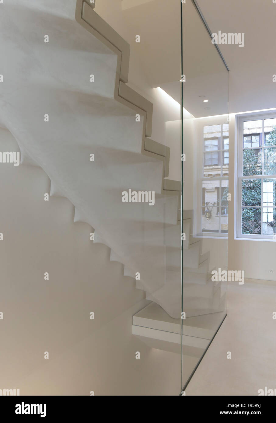 Side and rear view of interior staircase. Manhattan Townhouse, New York ...