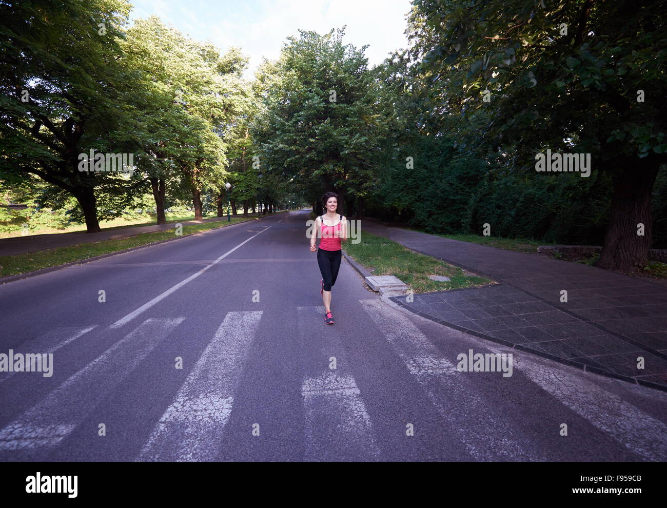 woman jogging in night dark, early morning running training Stock Photo ...