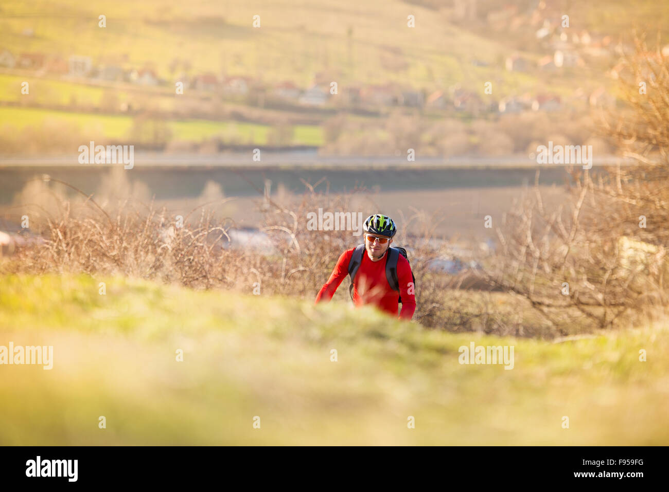 cyclist man riding mountain bike on outdoor trail in nature Stock Photo ...