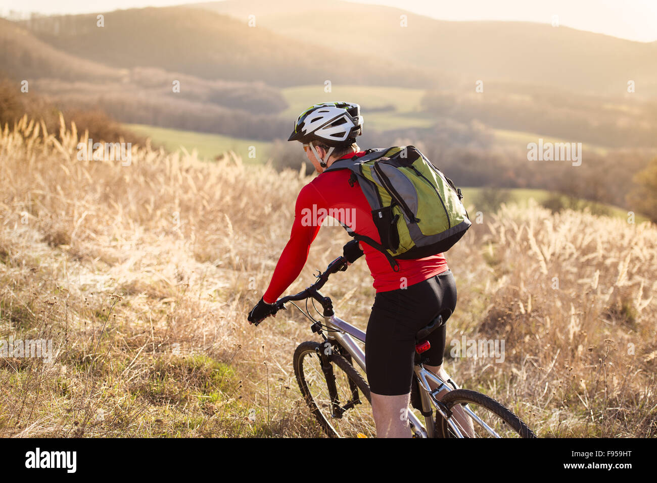 cyclist man riding mountain bike on outdoor trail in nature Stock Photo ...