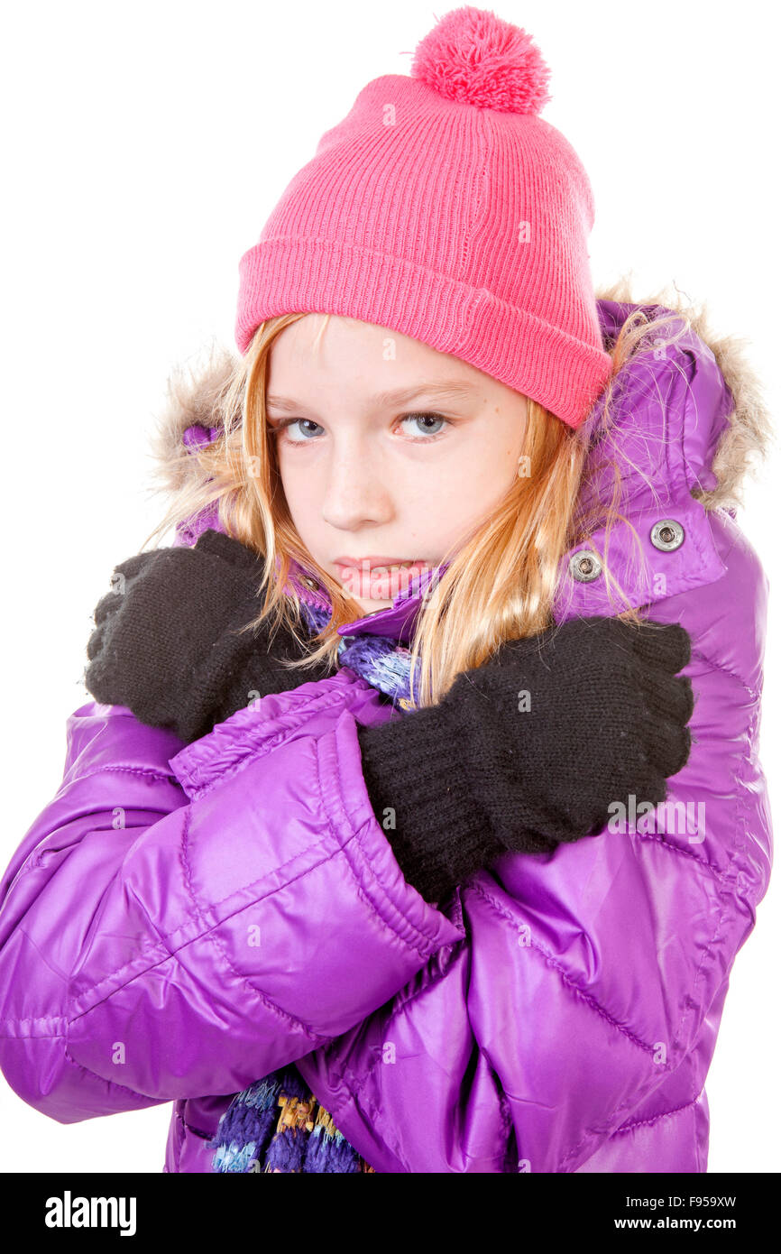 young girl in winter outfit heaving cold over white background Stock ...