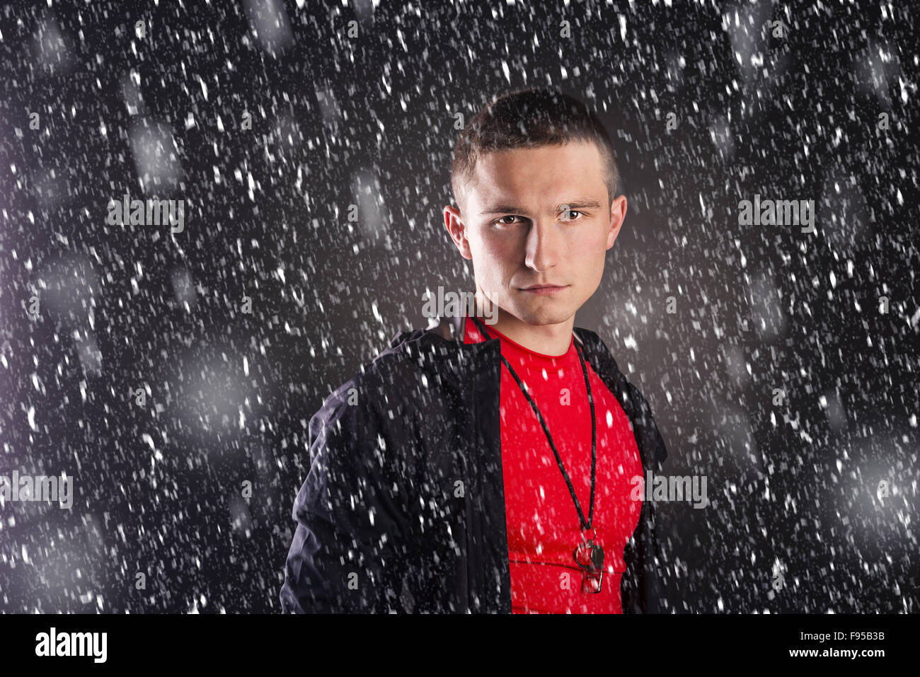 Professional fitness coach isolated on black background Stock Photo - Alamy