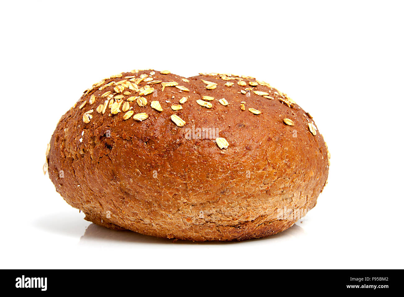 One healthy home baked bun on white background Stock Photo - Alamy