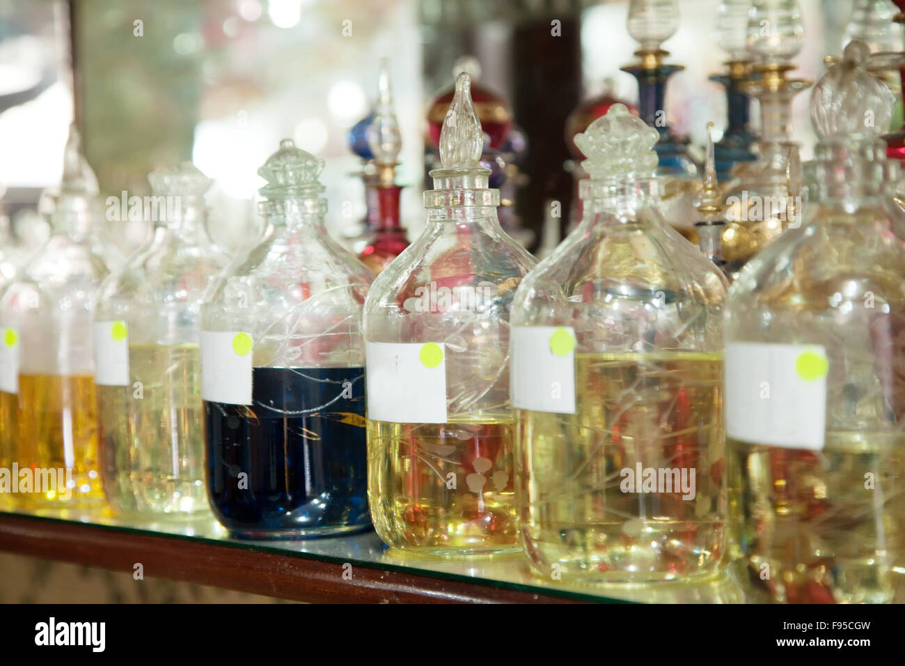 Bottles with essential oils at shop counter Stock Photo - Alamy