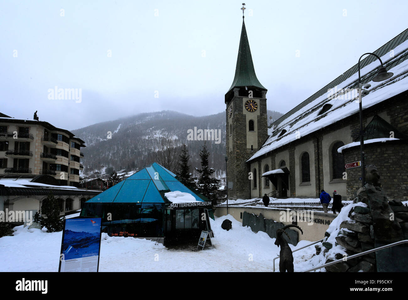 Winter snow, Parish church of St Mauritius, Zermatt town, Valais canton ...
