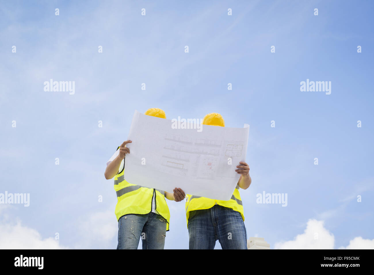 Construction Contractors building a big new home Stock Photo - Alamy