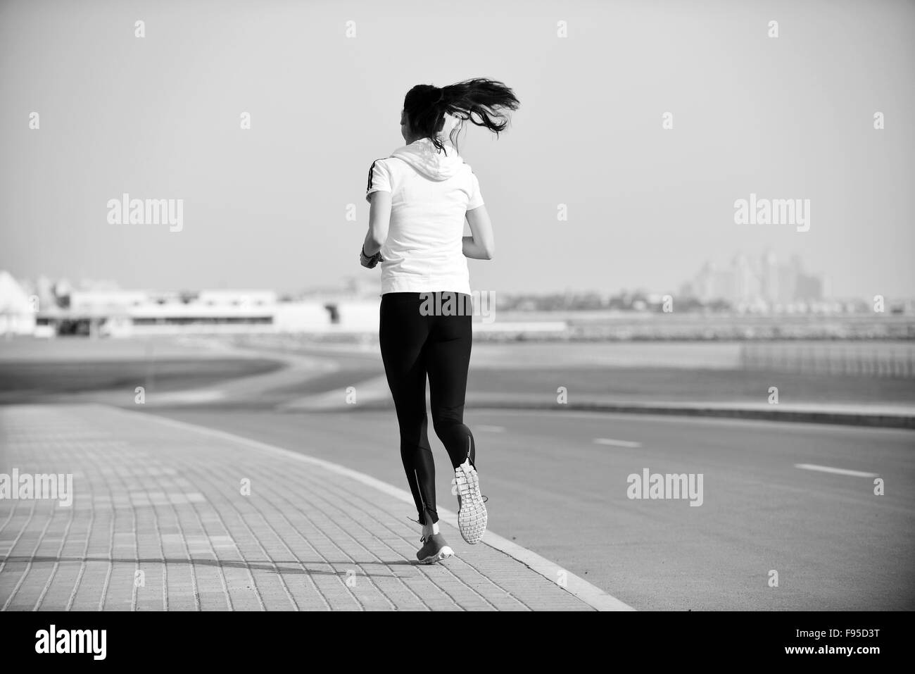 Woman sunrise run Black and White Stock Photos & Images - Alamy