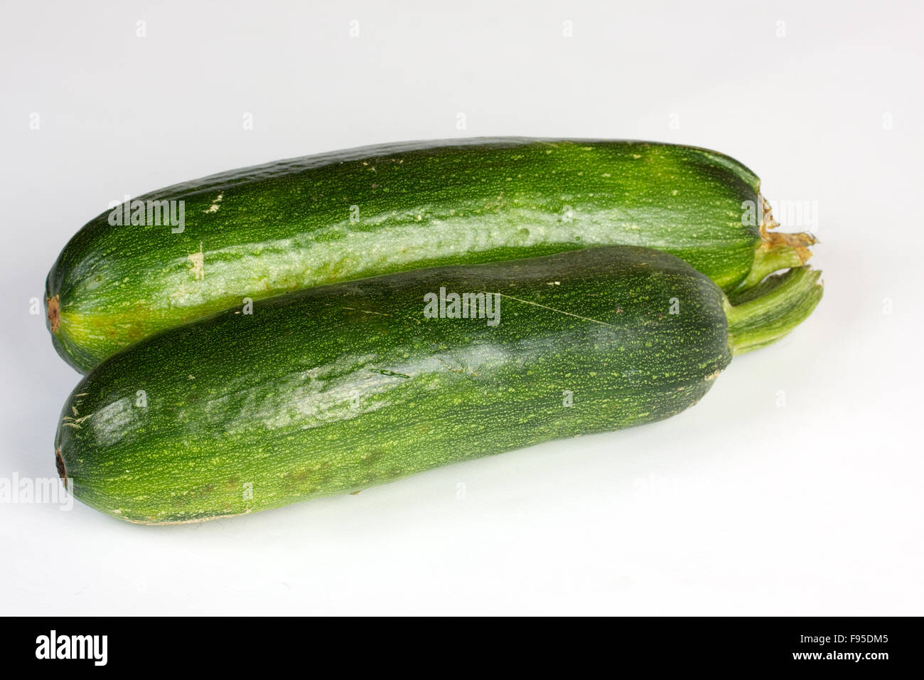 Zucchini isolated on white background Stock Photo - Alamy