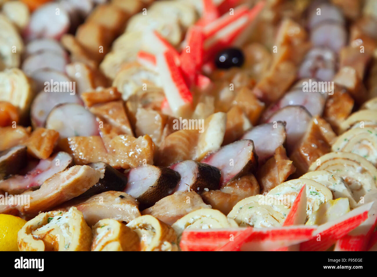 assortment of cold cuts fish on table in buffet Stock Photo - Alamy