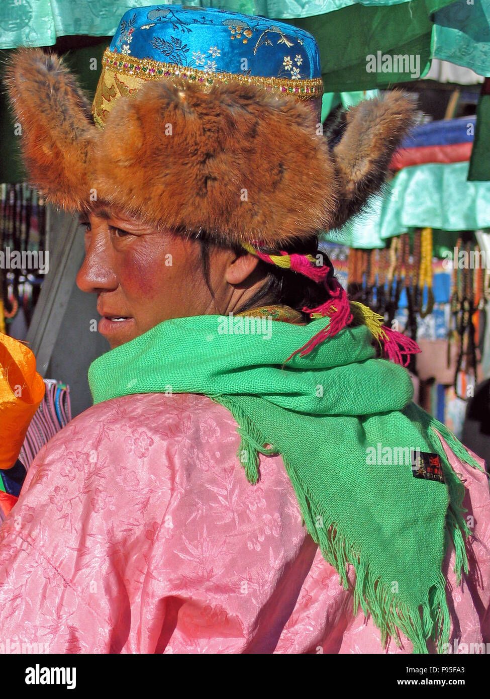 Tibetan wearing fur hat Stock Photo - Alamy
