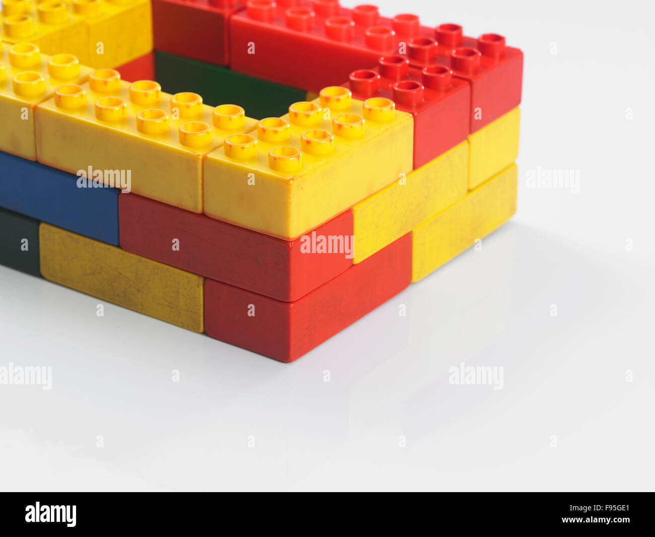 Plastic building blocks isolated on white background Stock Photo - Alamy