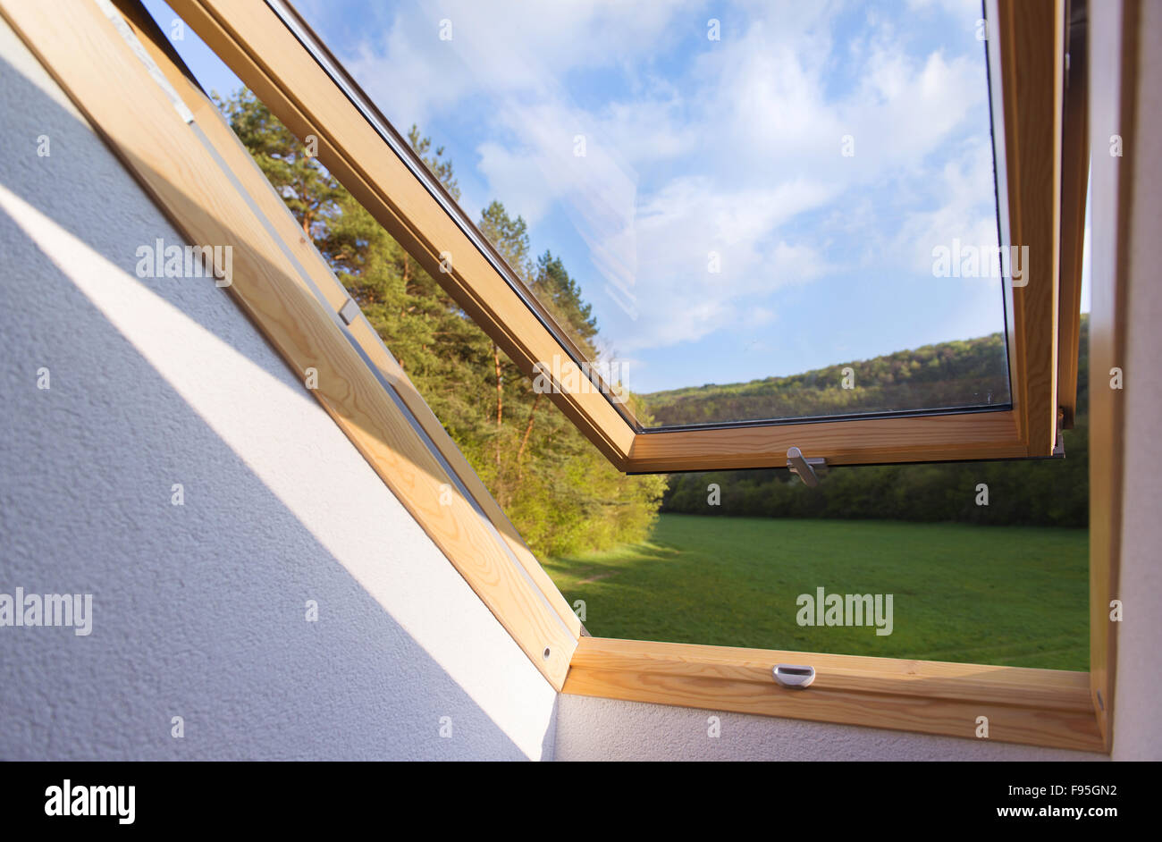 Beautiful nature view through roof skylight window in attic room Stock ...