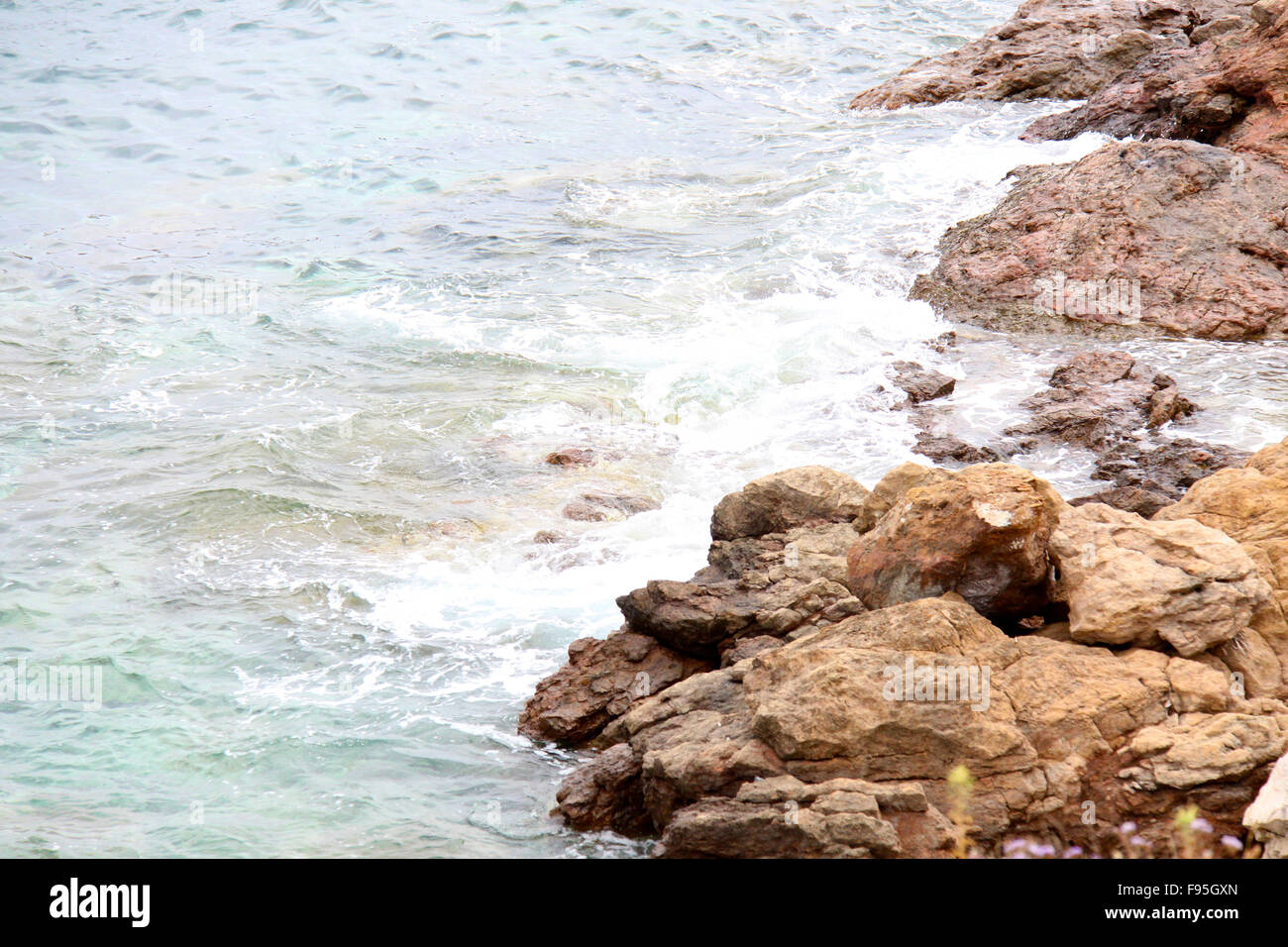 Waves on the Greek seashore Aegean sea Stock Photo - Alamy