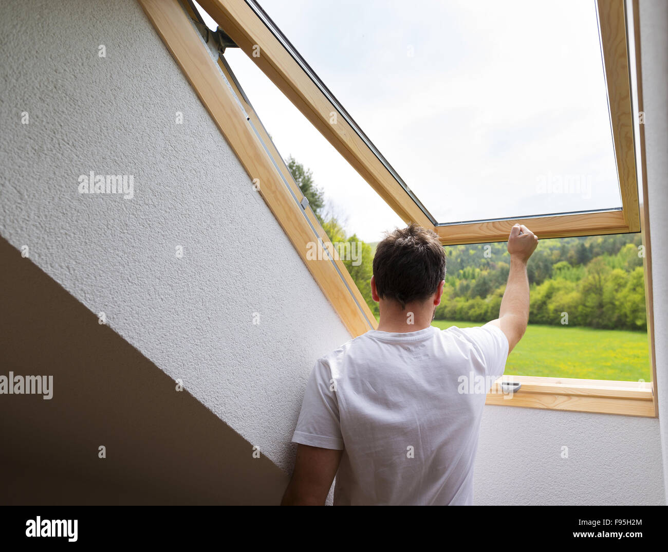 Beautiful nature view through roof skylight window in attic room Stock ...