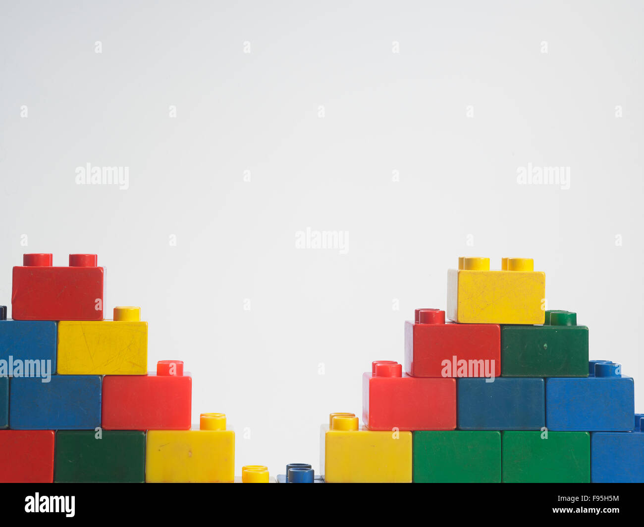 Plastic building blocks isolated on white background Stock Photo - Alamy