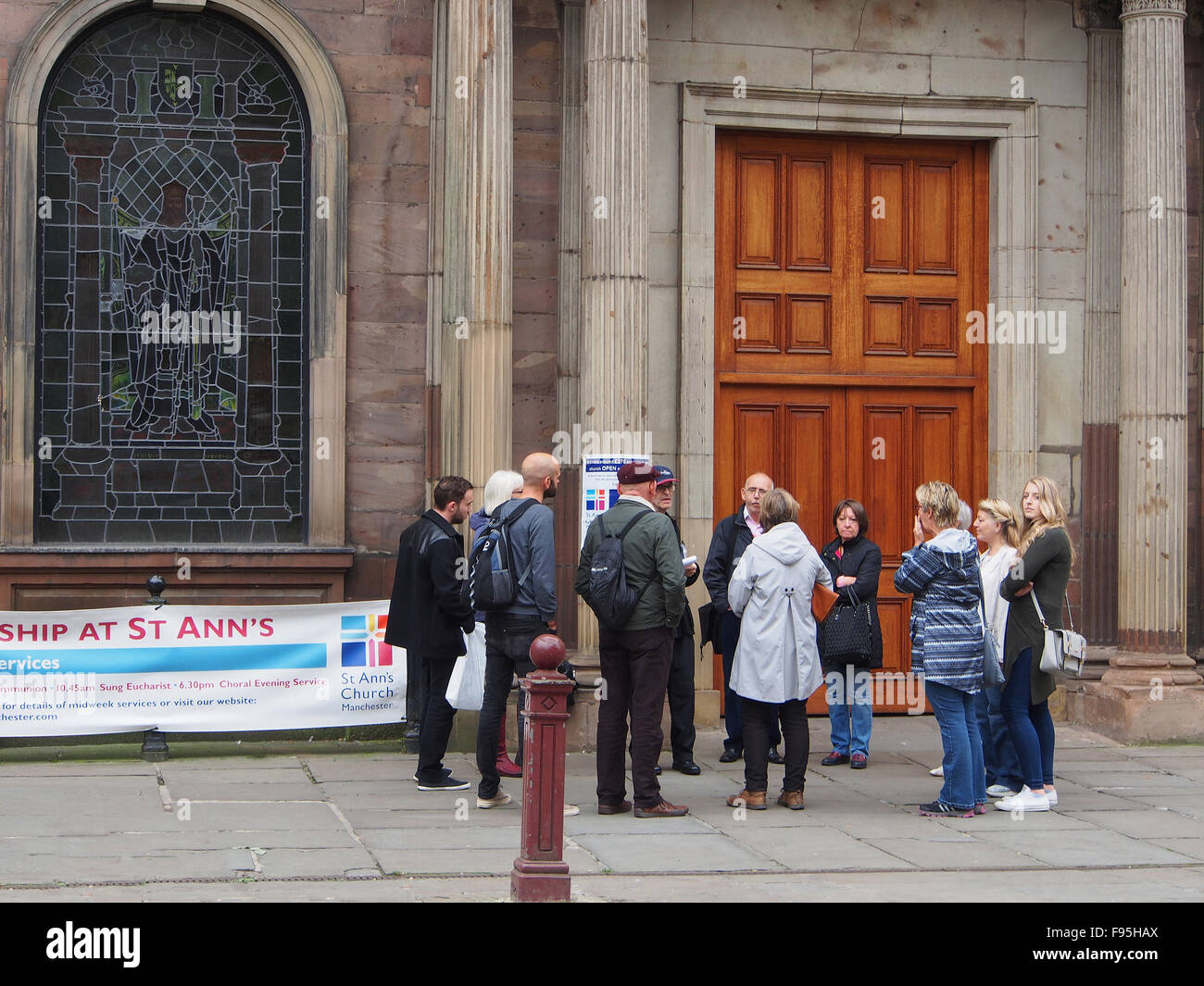 People going on a guided tour of Manchester meeting at Saint Annes ...