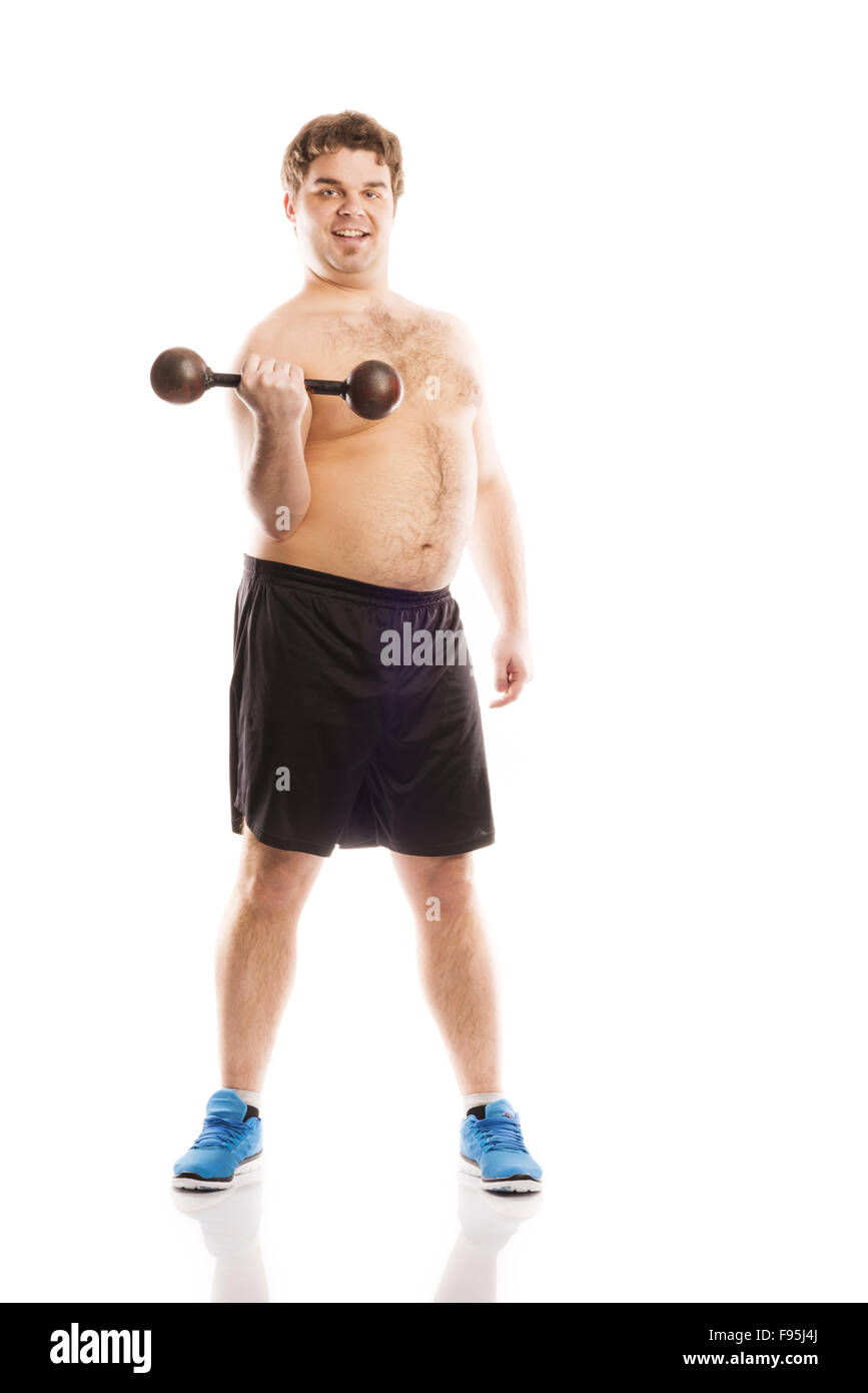 Fat fitness man is posing in studio on white background Stock Photo - Alamy