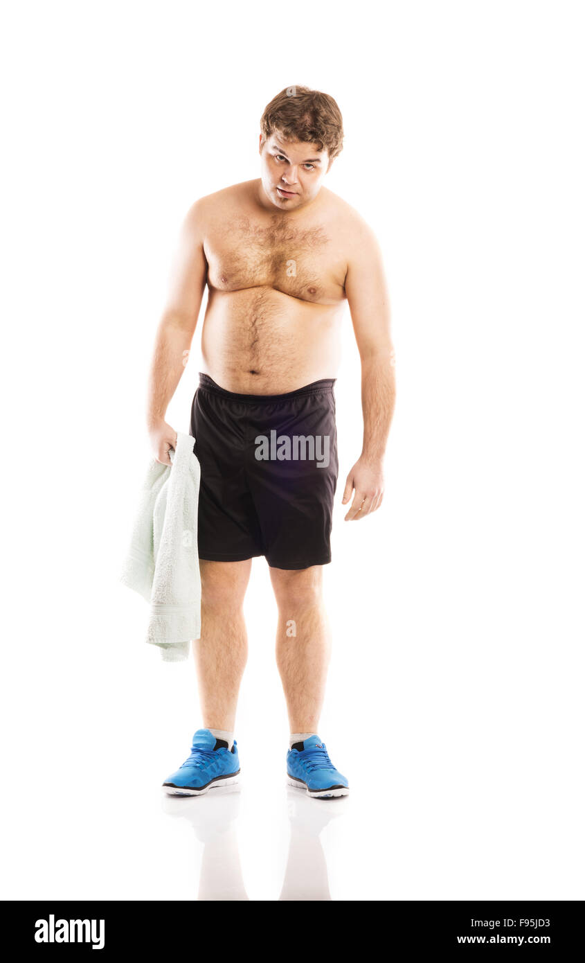 Fat fitness man is posing in studio on white background Stock Photo - Alamy