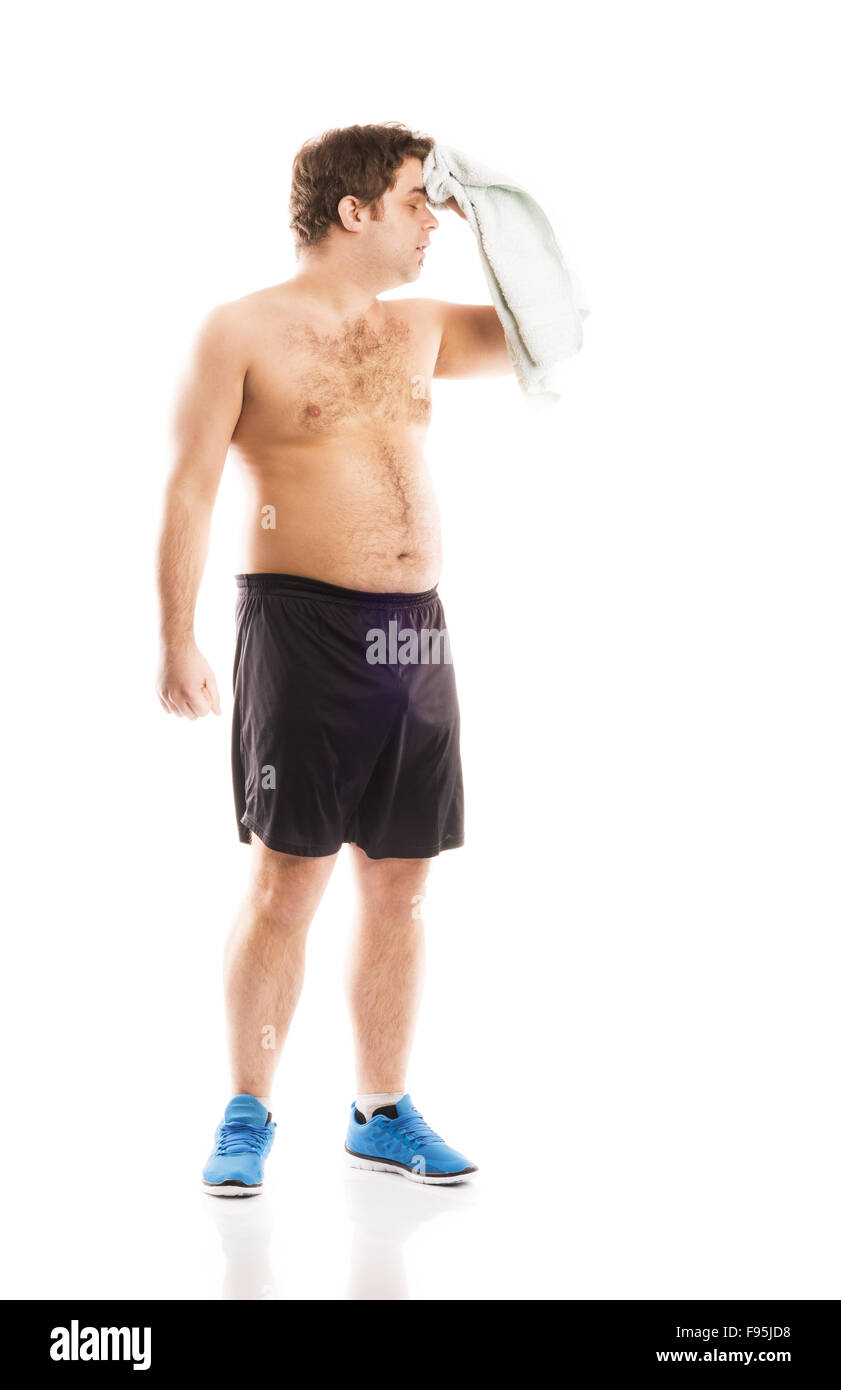 Fat fitness man is posing in studio on white background Stock Photo - Alamy