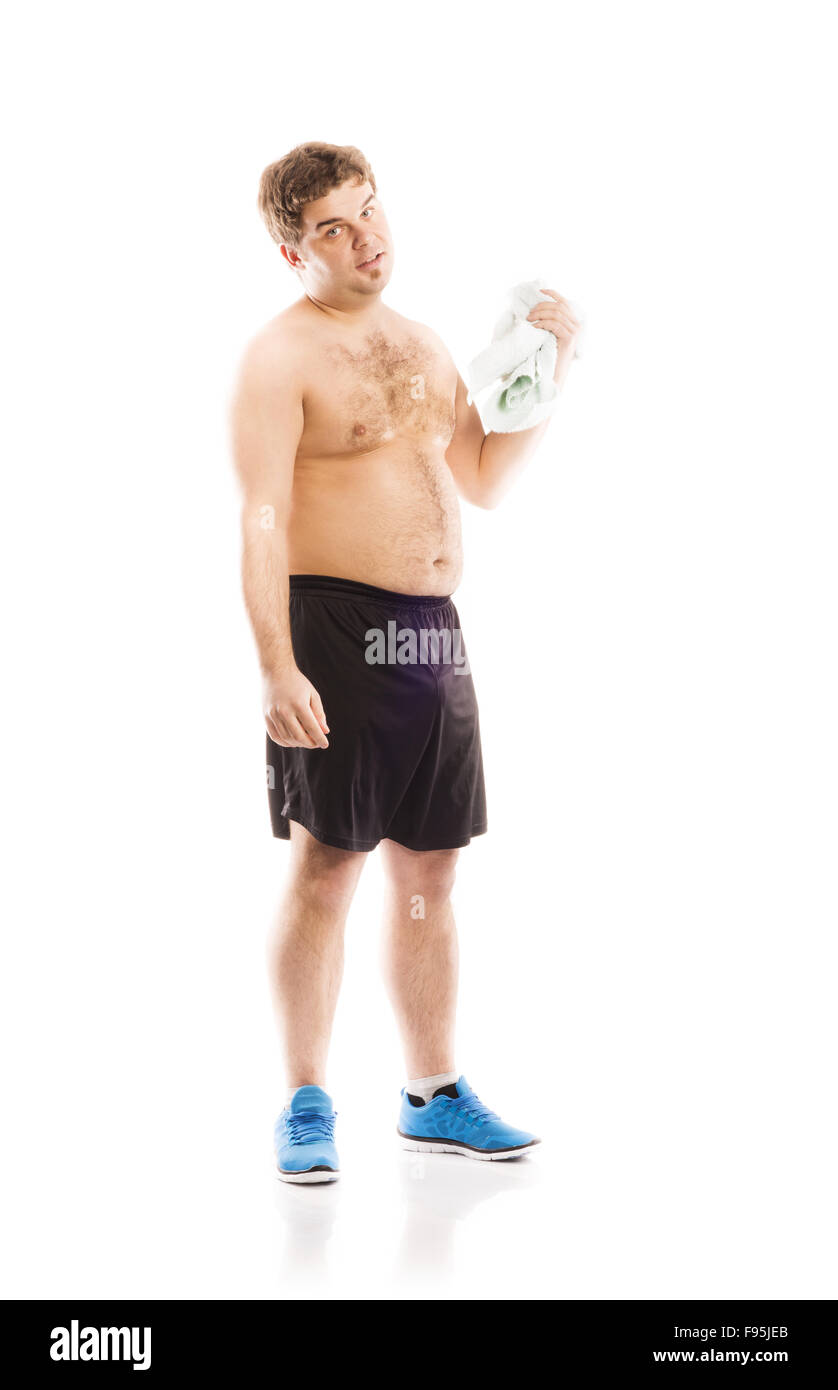 Fat fitness man is posing in studio on white background Stock Photo - Alamy