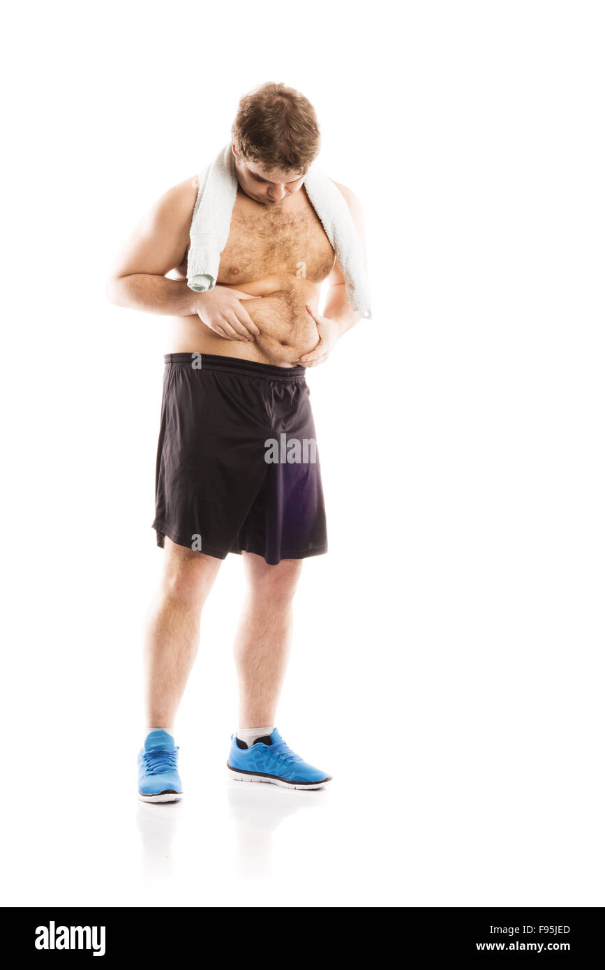 Fat fitness man is posing in studio on white background Stock Photo - Alamy