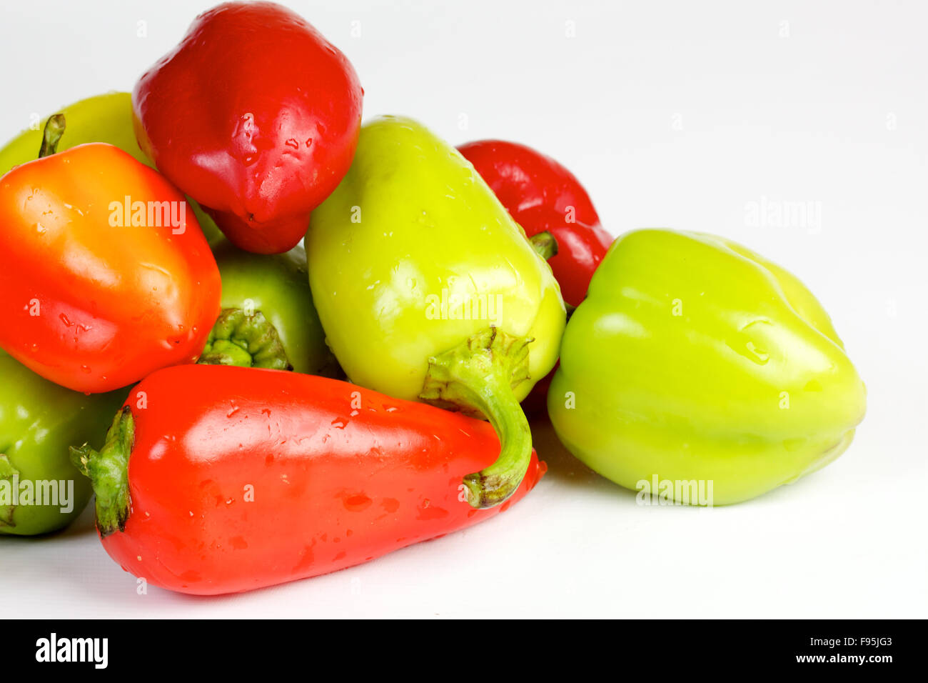 Bell pepper mix on the white background Stock Photo - Alamy