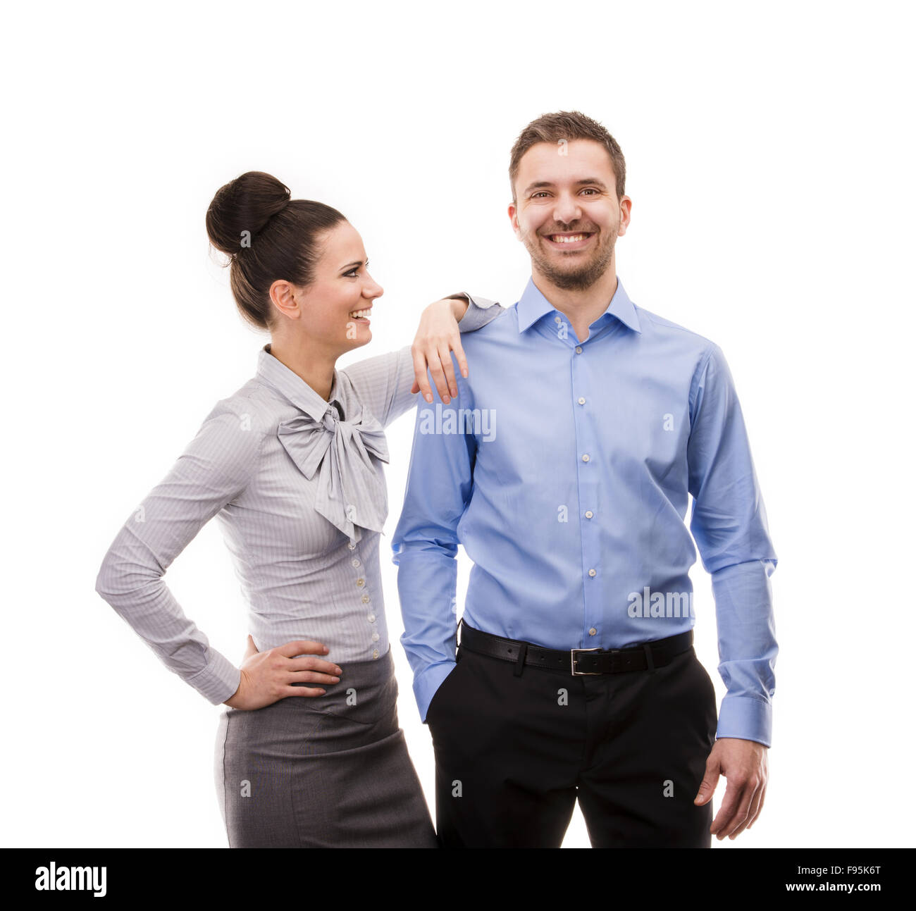 Young smiling business woman and business man isolated over white ...