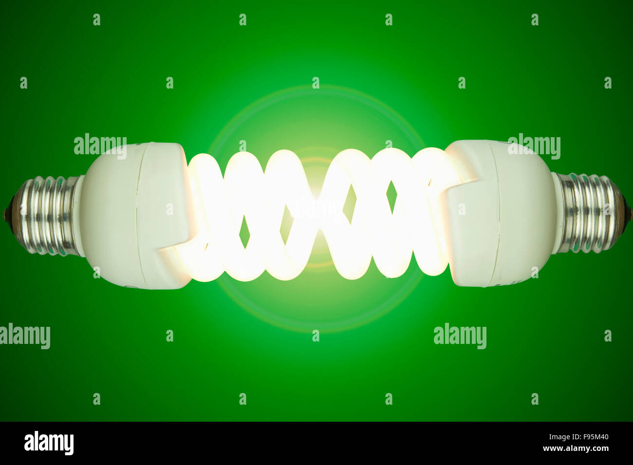 Low energy light bulbs joined together glowing Stock Photo - Alamy
