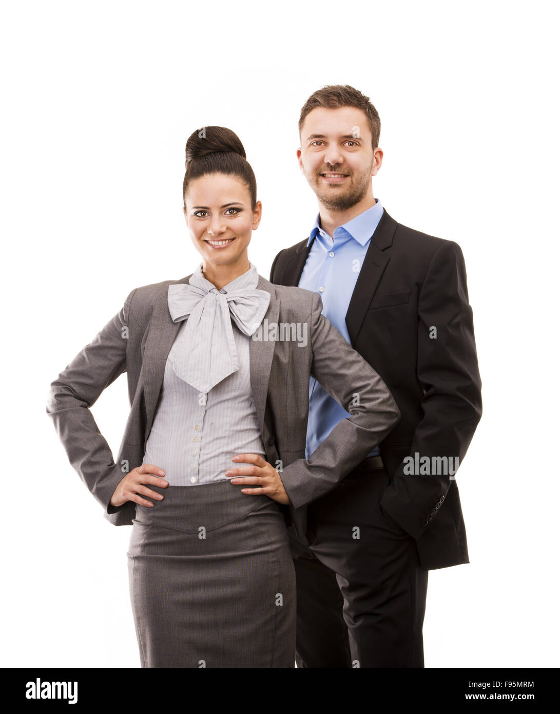 Young smiling business woman and business man isolated over white ...