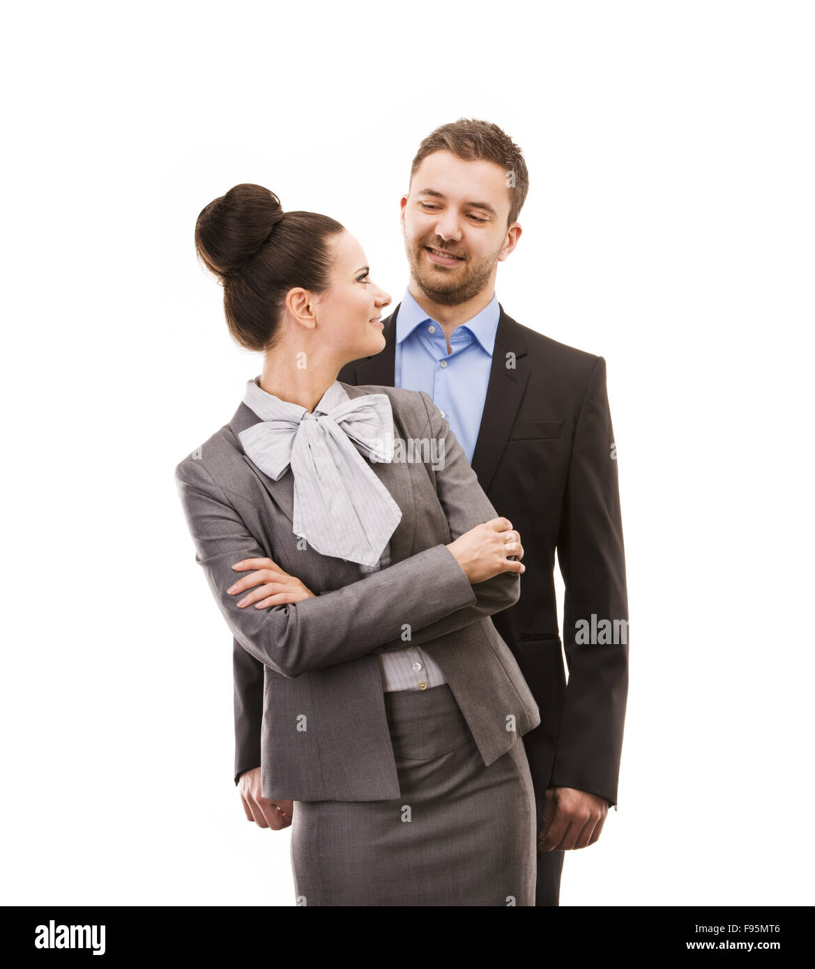 Young smiling business woman and business man isolated over white ...