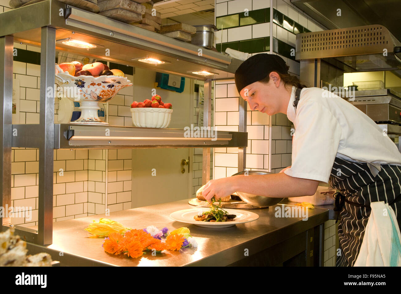 Chef working in kitchen Stock Photo - Alamy