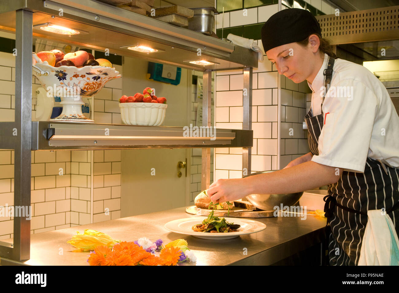 Chef working in kitchen Stock Photo - Alamy
