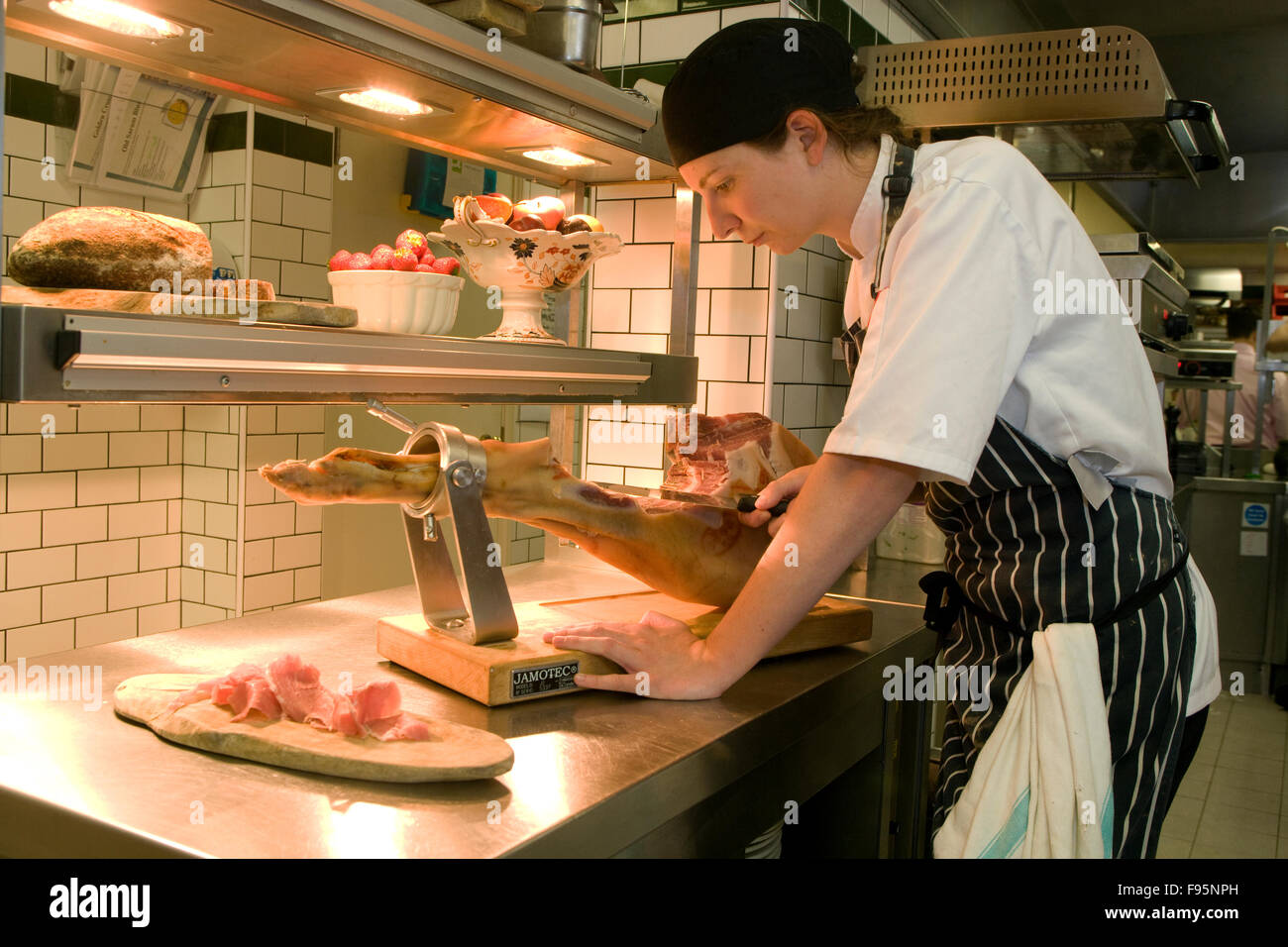 Chef working in kitchen Stock Photo - Alamy