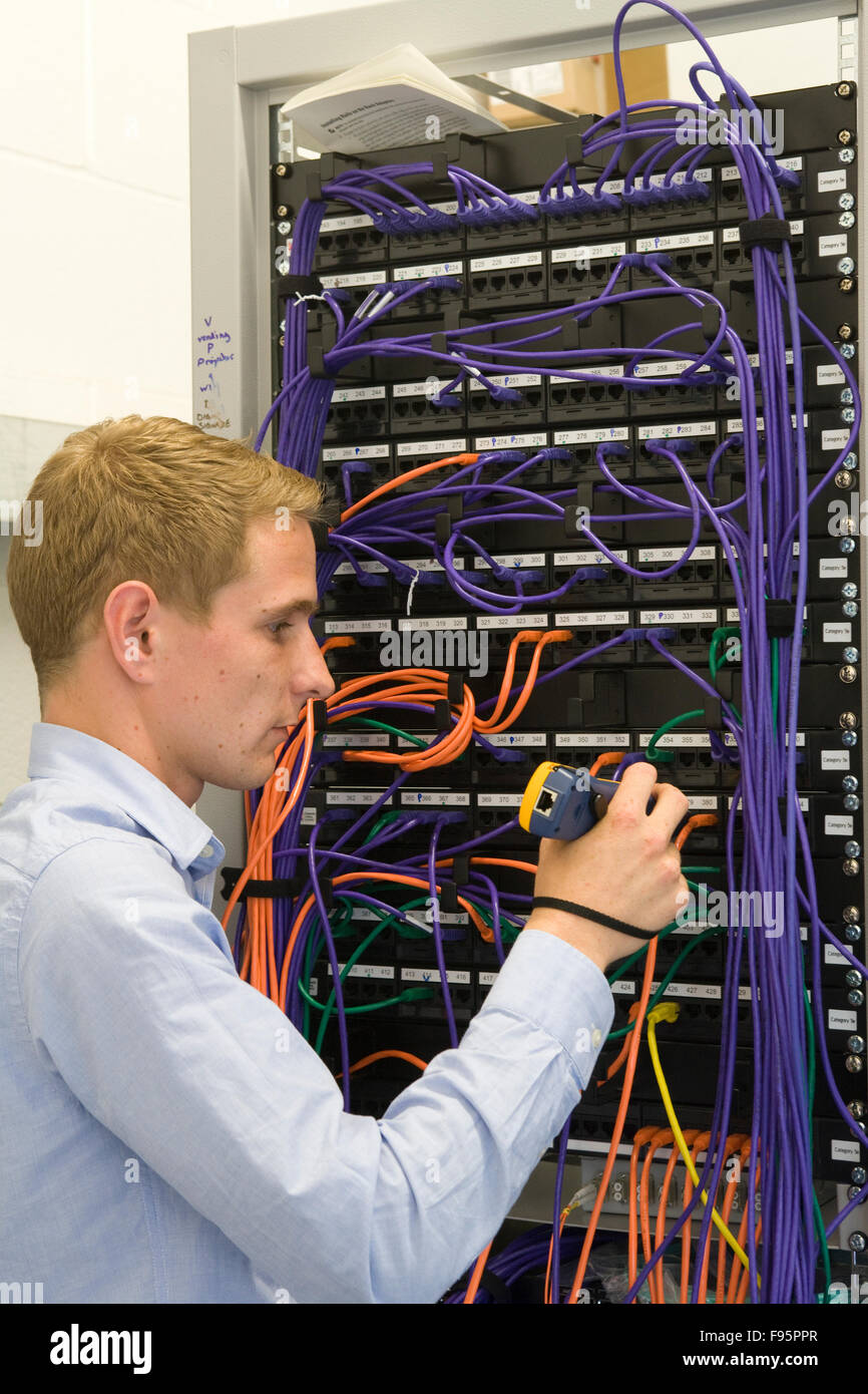 Apprentice IT student testing server Stock Photo - Alamy