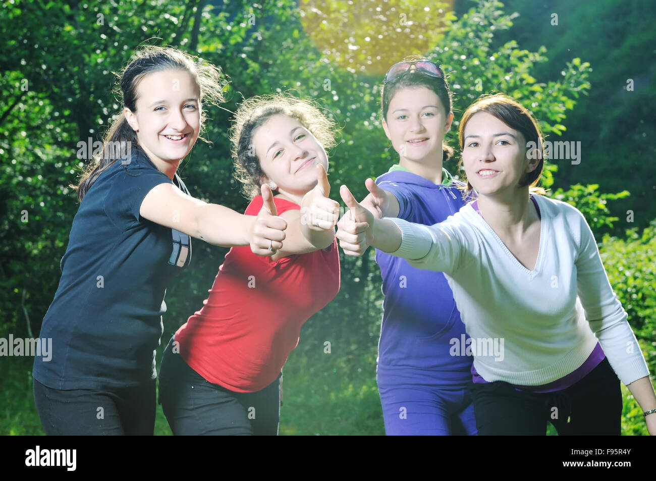 happy teen girls group outdoor have fun Stock Photo - Alamy