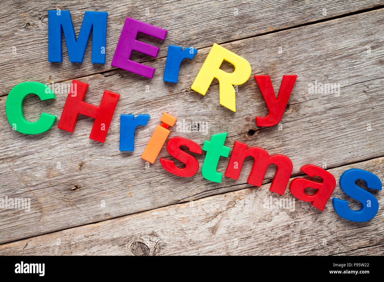 Merry Christmas message written in a colorful plastic letters Stock ...