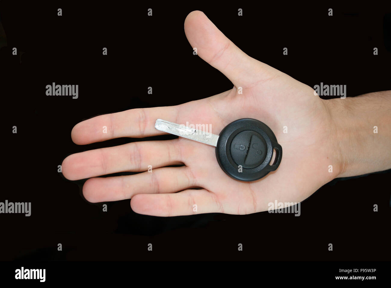 Hand With Key Stock Photo - Alamy