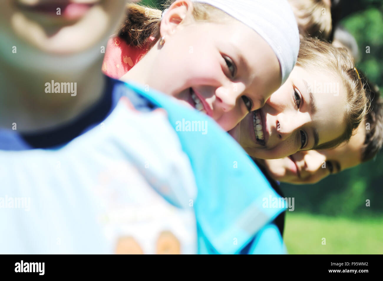 happy children group have fun outdoor in nature at suny day Stock Photo ...