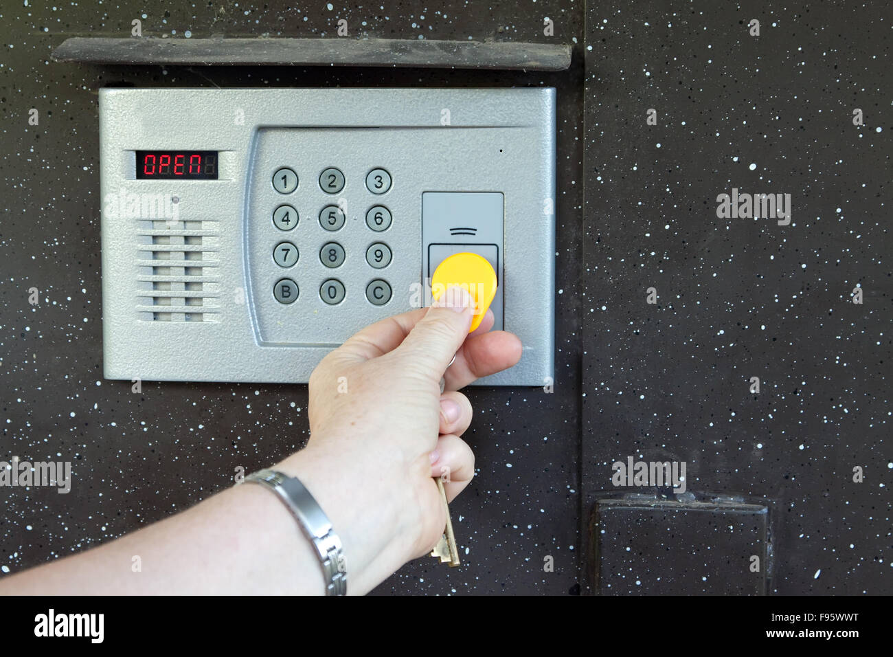 Close-up of uses intercom in steel door Stock Photo - Alamy