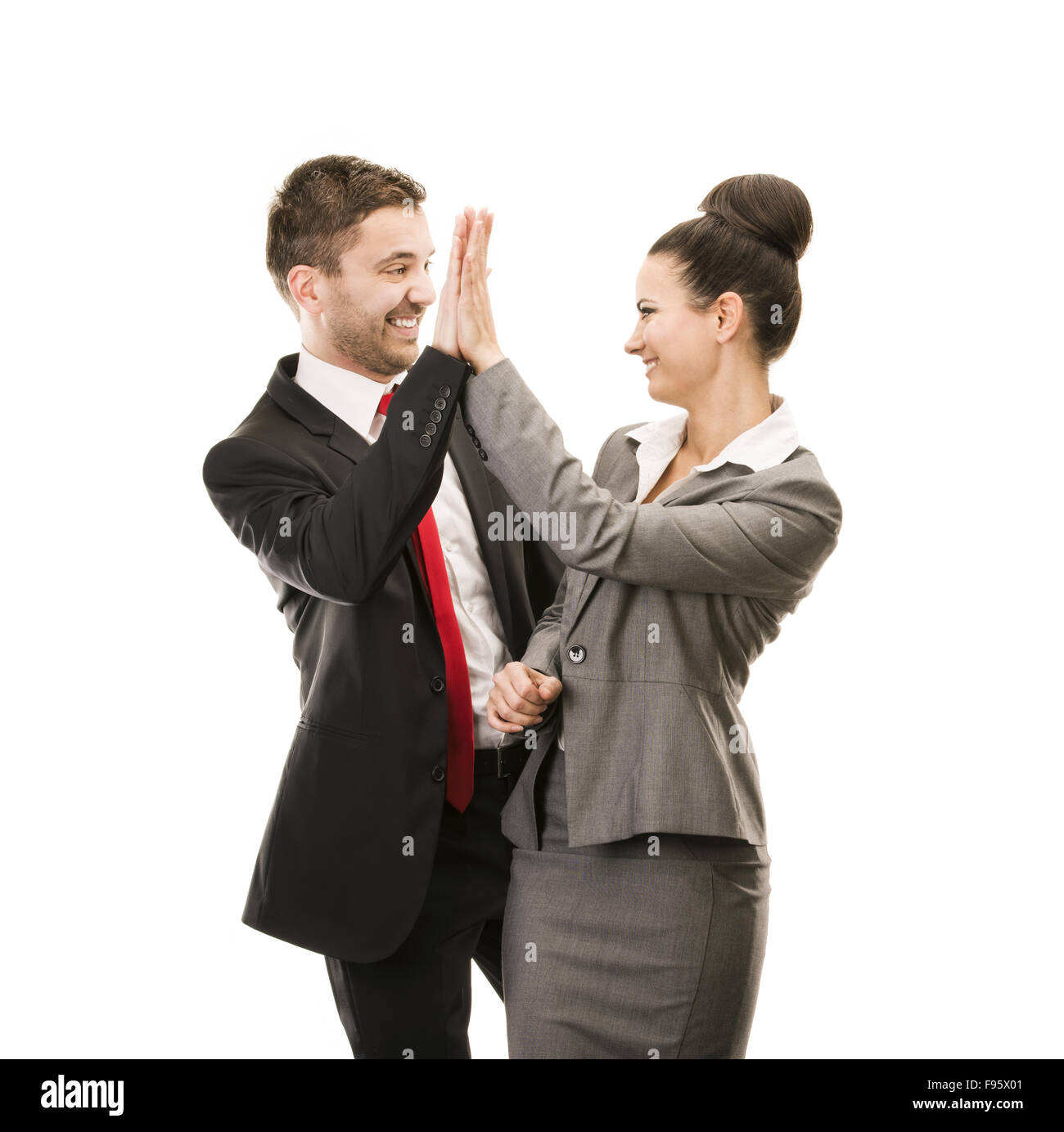 Young smiling business woman and business man isolated over white ...
