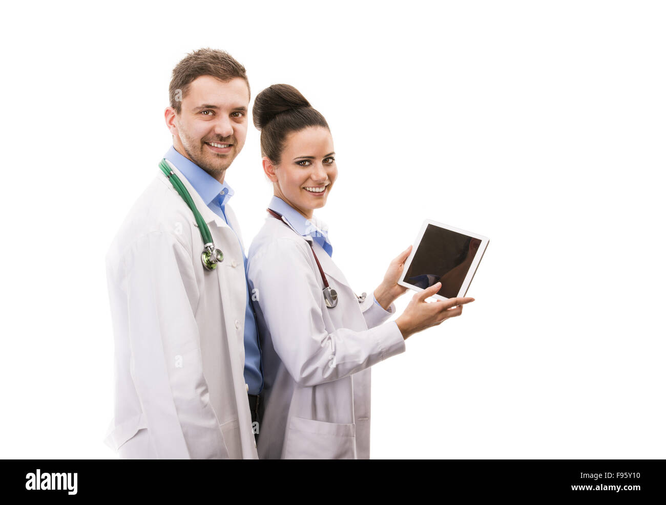 Happy medical team of doctors, man and woman, isolated over white ...
