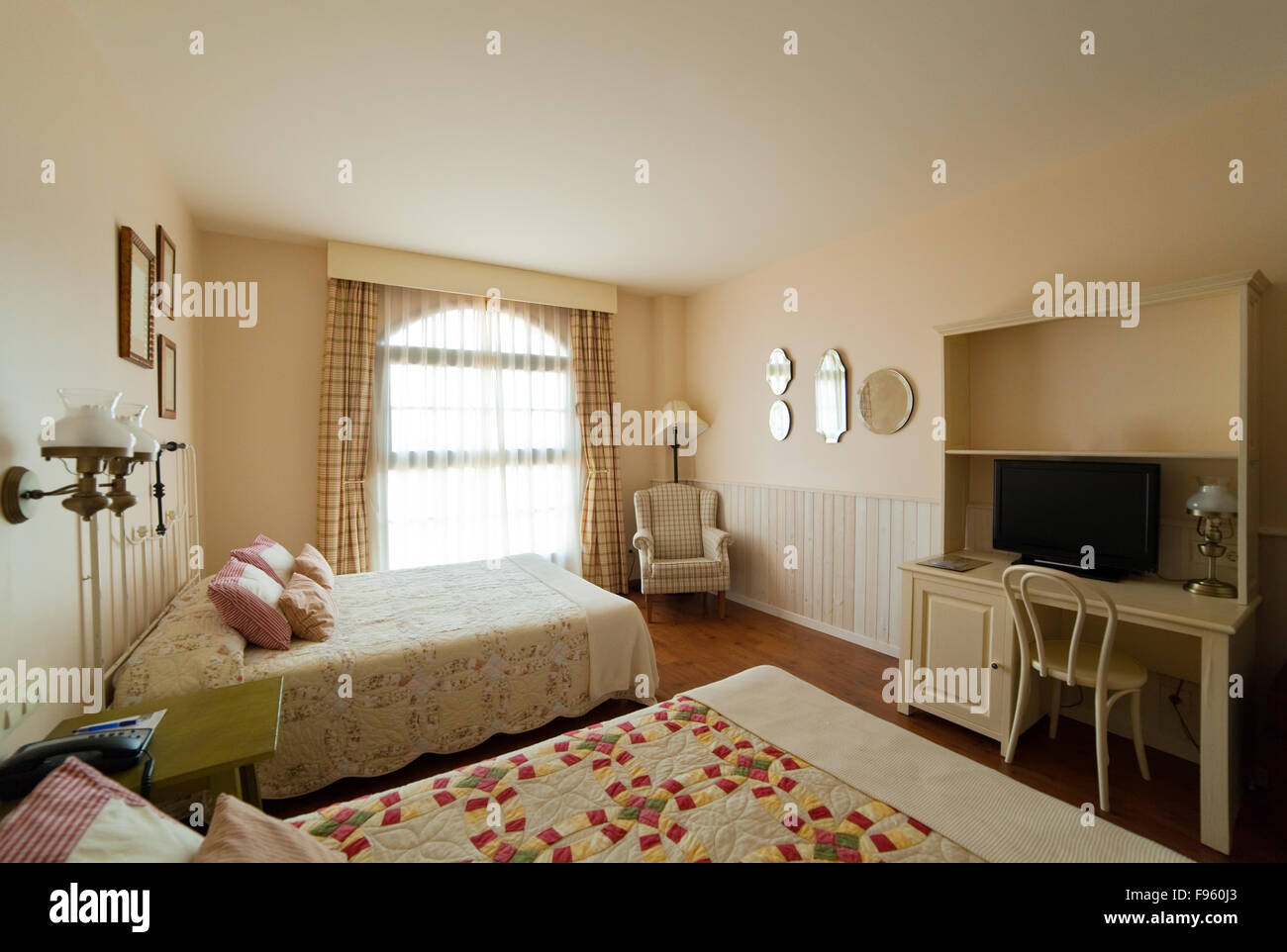 interior of bedroom with two double bed Stock Photo - Alamy