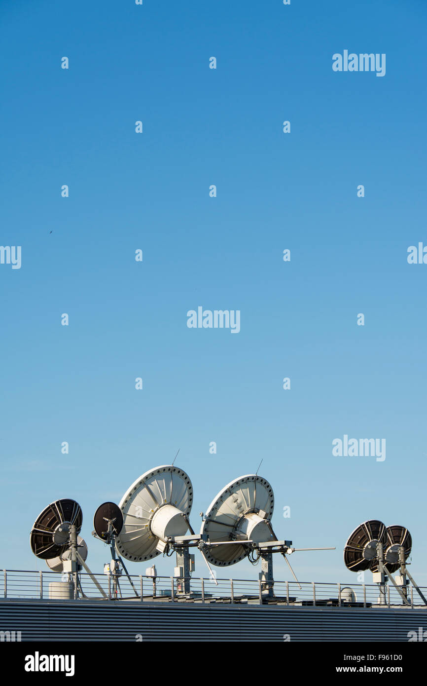 Communications dishes on rooftop hi-res stock photography and images ...