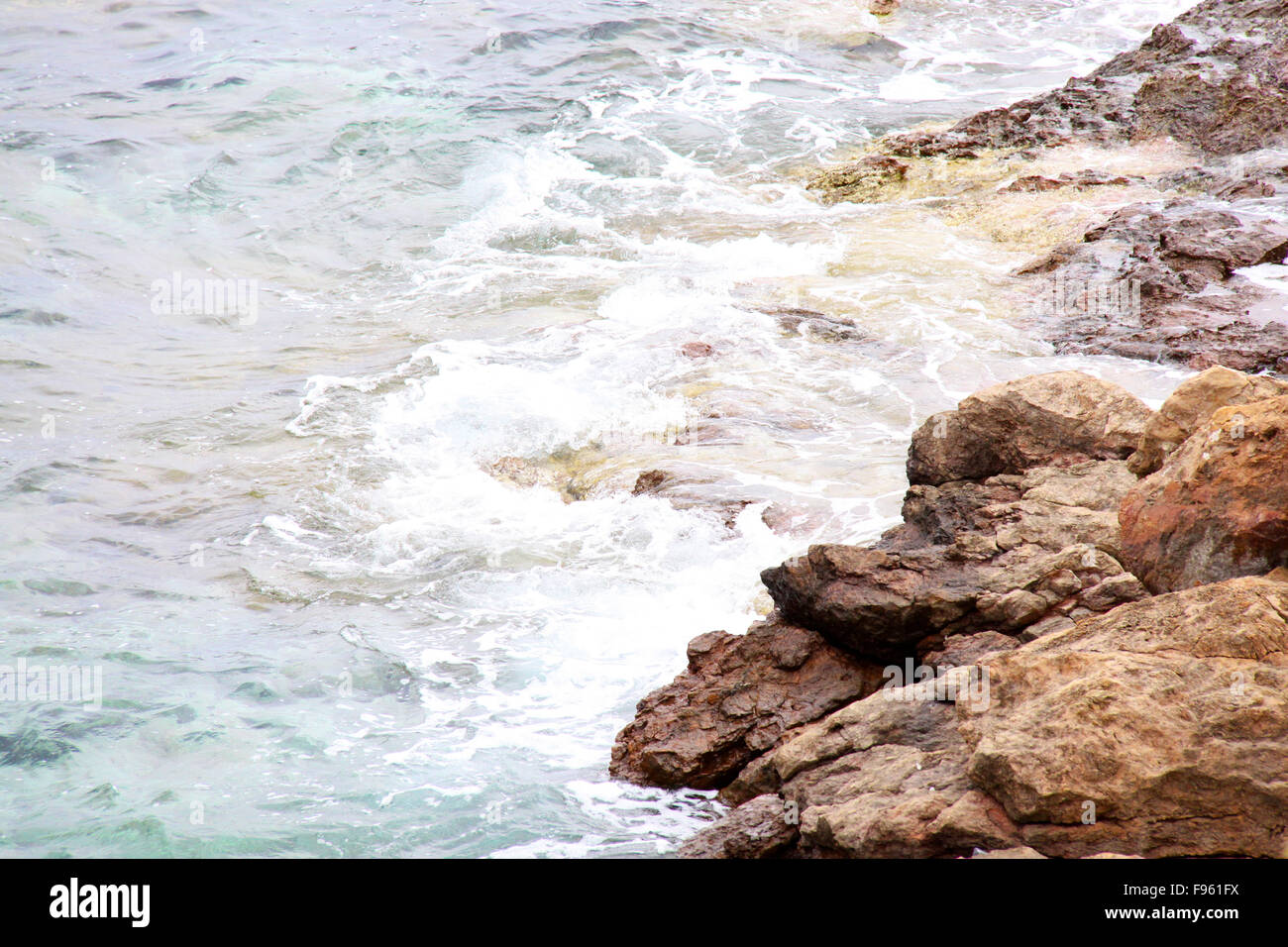 Waves on the Greek seashore Aegean sea Stock Photo - Alamy