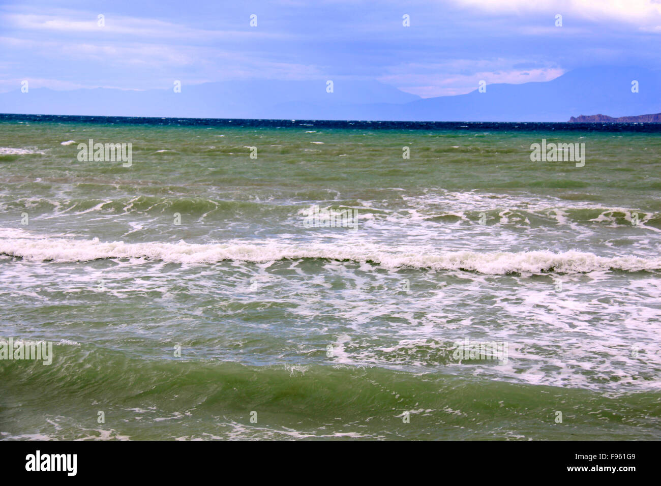Waves on the Greek seashore Aegean sea Stock Photo - Alamy