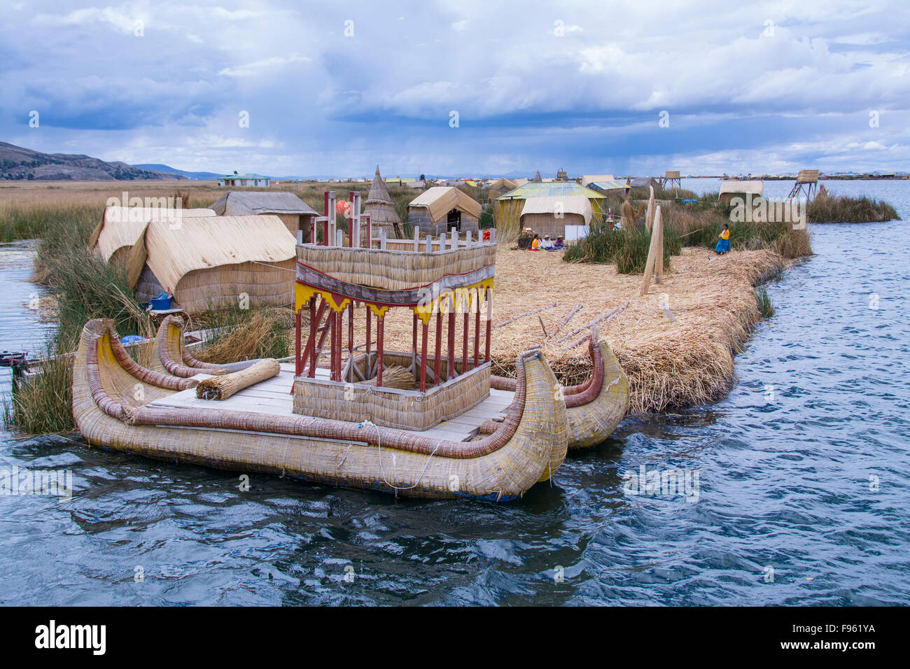 Local residents of floating reed islands of Uros, Lake Titicaca, Peru ...