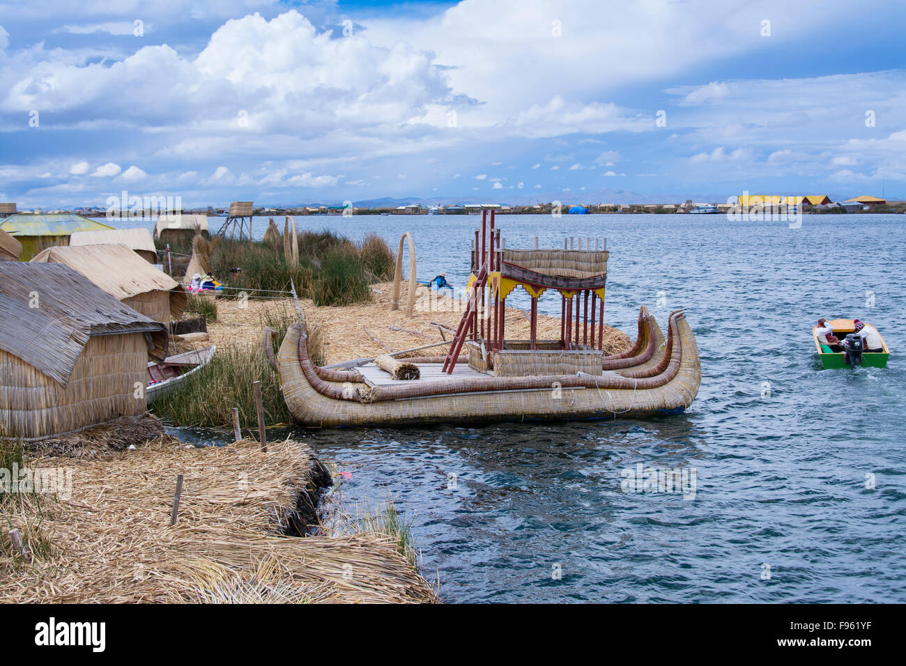 Local residents of floating reed islands of Uros, Lake Titicaca, Peru ...