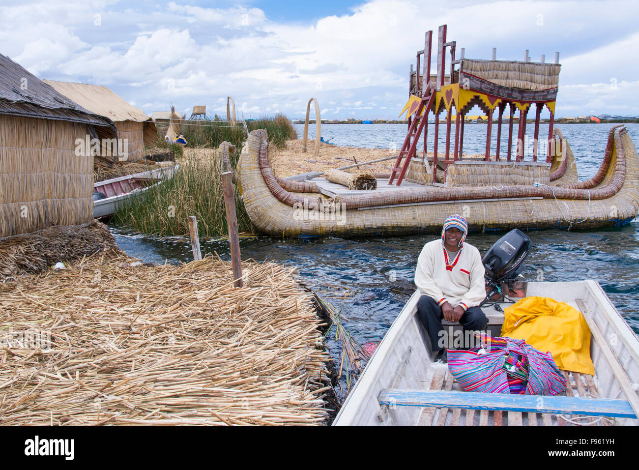 Local residents of floating reed islands of Uros, Lake Titicaca, Peru ...